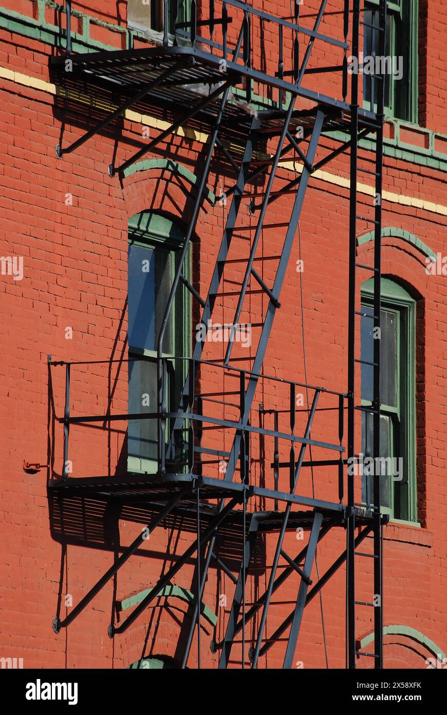 Wrought iron fire escape stairs hi-res stock photography and images - Alamy