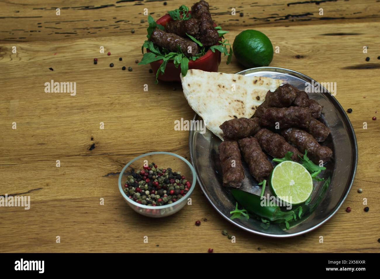 Kebabs - grilled meat, bread and vegetables Stock Photo - Alamy