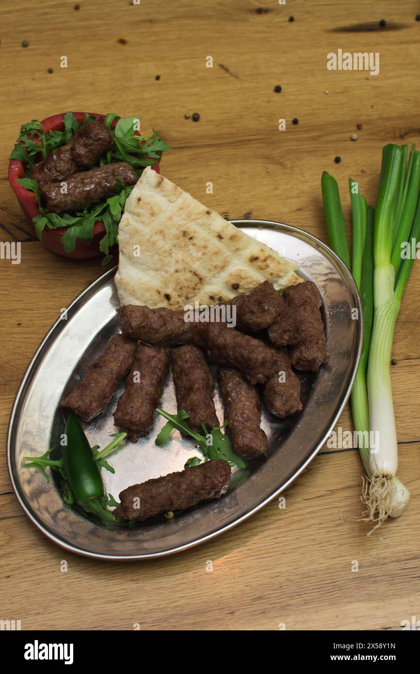 Kebabs - grilled meat, bread and vegetables Stock Photo - Alamy