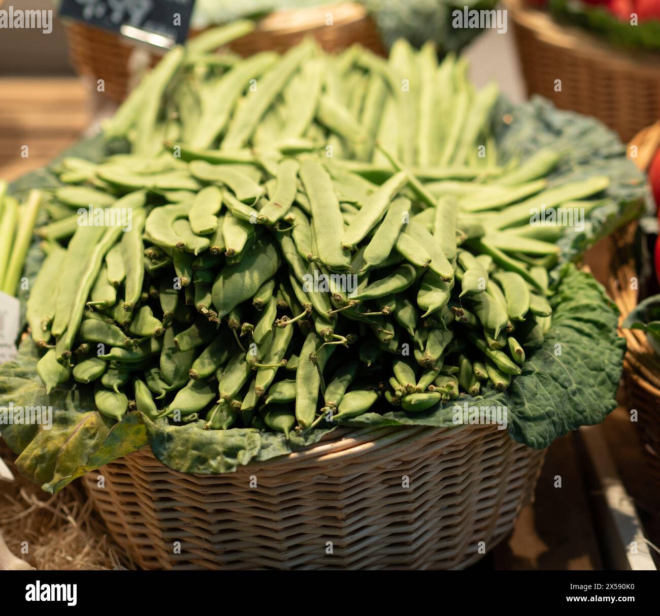 Basket of green beans on display for sale at the market Stock Photo - Alamy