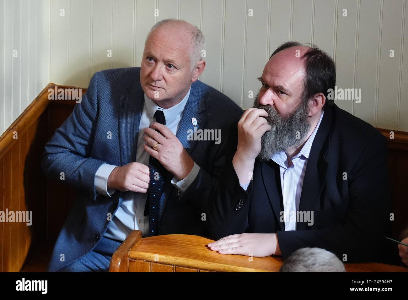 Murray Foote (left), chief executive of the SNP, watches as John ...
