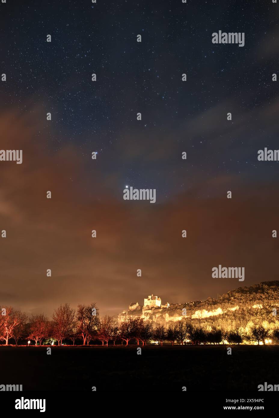 Beynac-et-Cazenac, France - 6th May 2024: Nightfall over Chateau de Beynac in the Dordogne ...