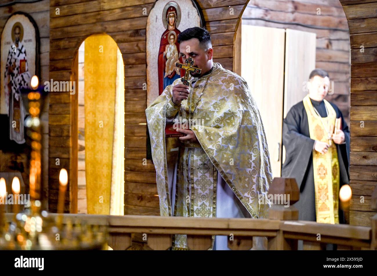 Non Exclusive: ZAPORIZHZHIA, UKRAINE - MAY 5, 2024 - A priest is ...