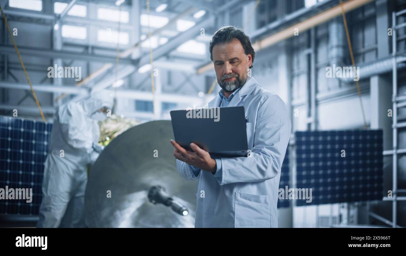 Engineer develop satellite on computer hi-res stock photography and ...