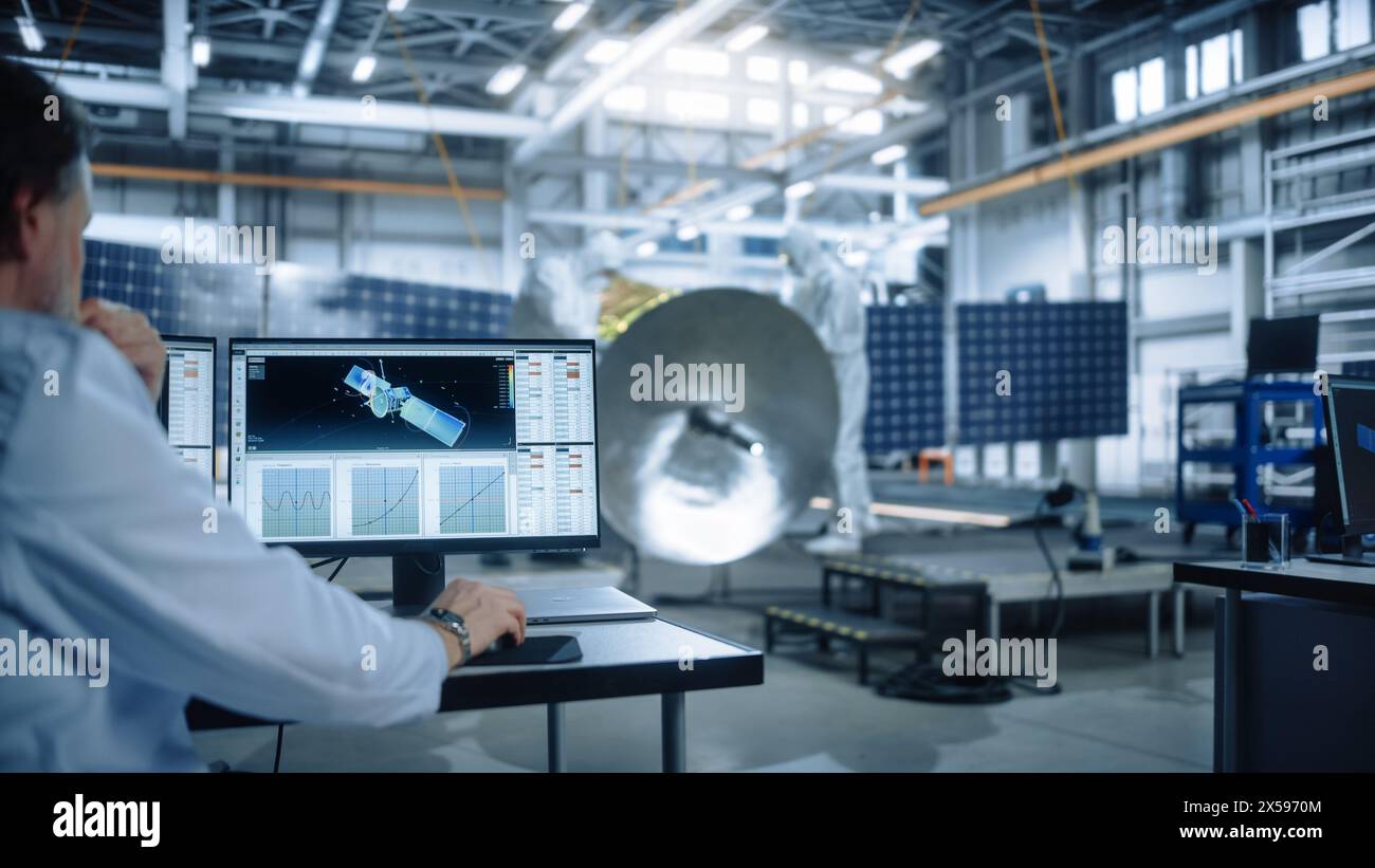 Team of Engineers Working on Satellite Construction. Aerospace Agency ...