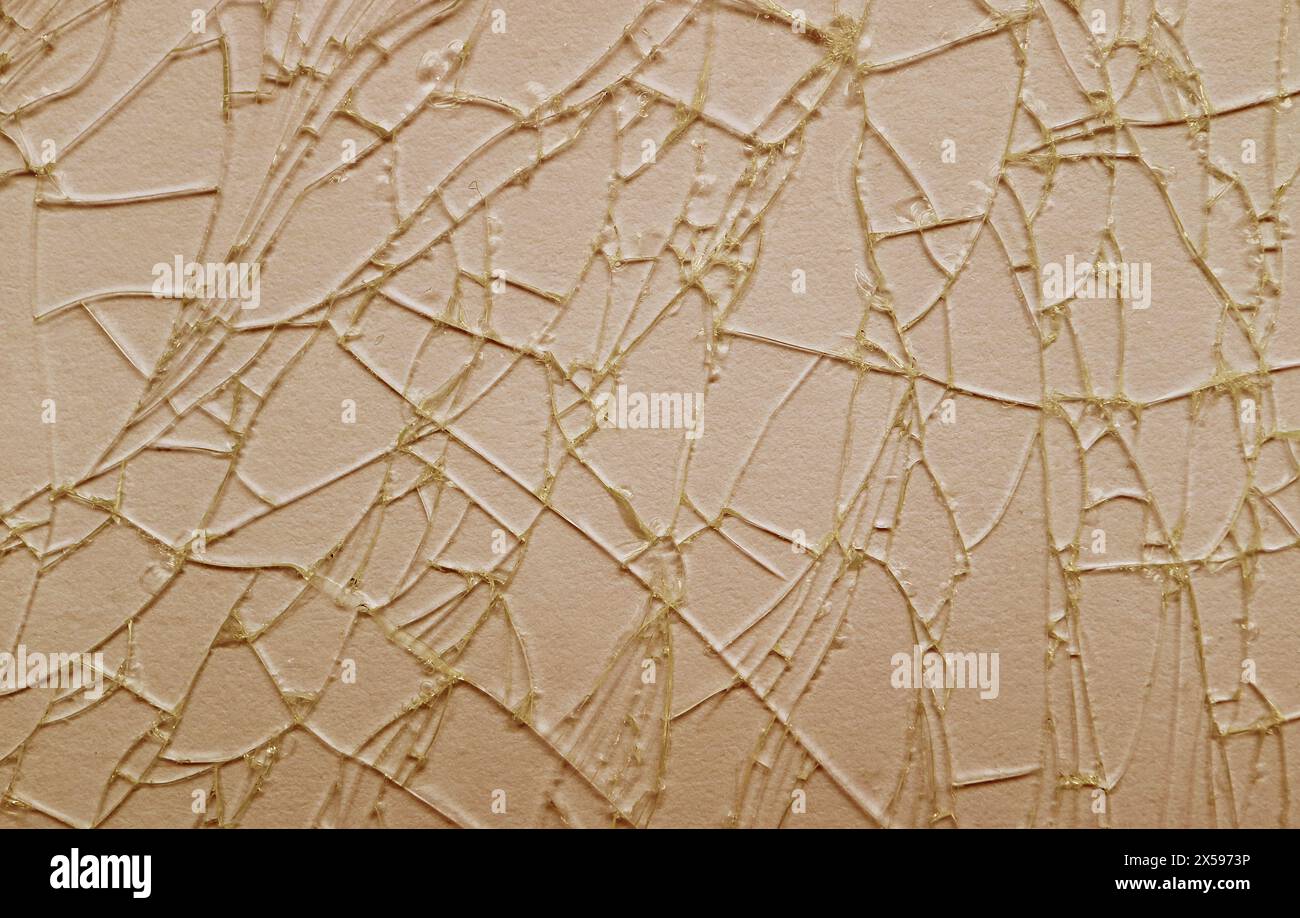 Artistic pattern of a sepia color cracked glass surface Stock Photo - Alamy