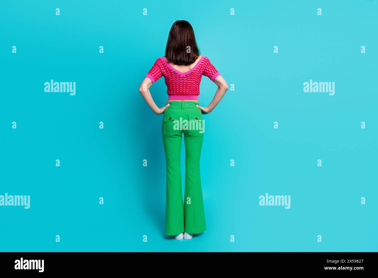 Back rear spine view photo of posing lady model show brand new clothes ...