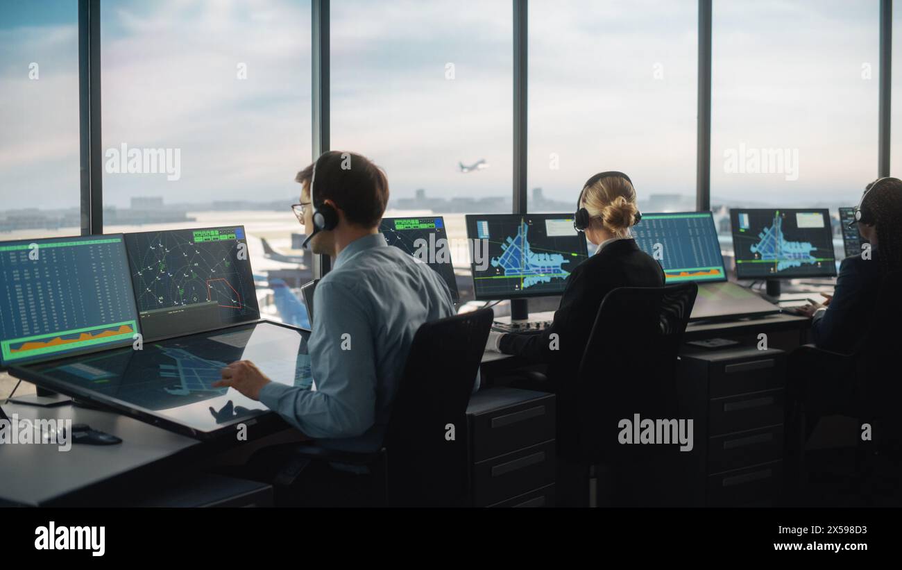 Diverse Air Traffic Control Team Working in a Modern Airport Tower ...