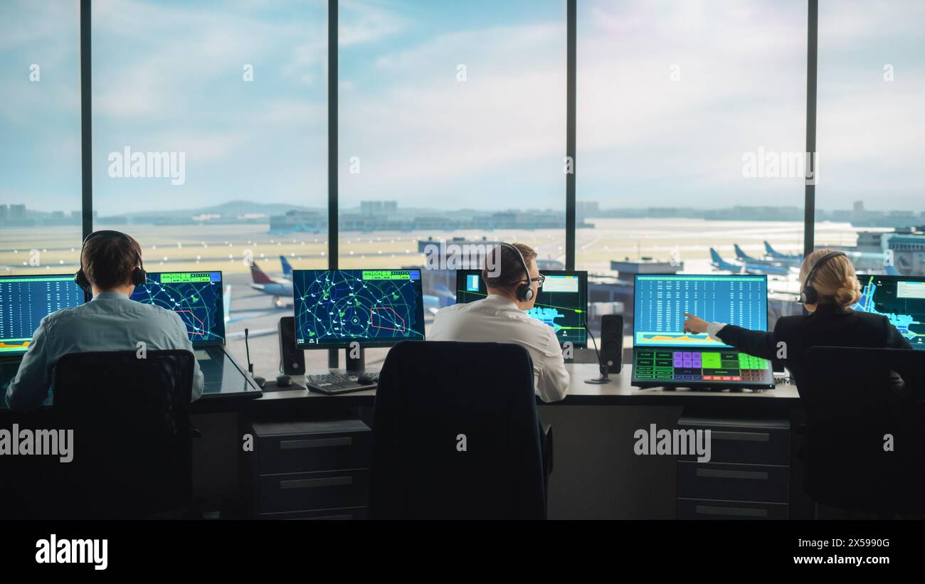 Diverse Air Traffic Control Team Working in a Modern Airport Tower ...