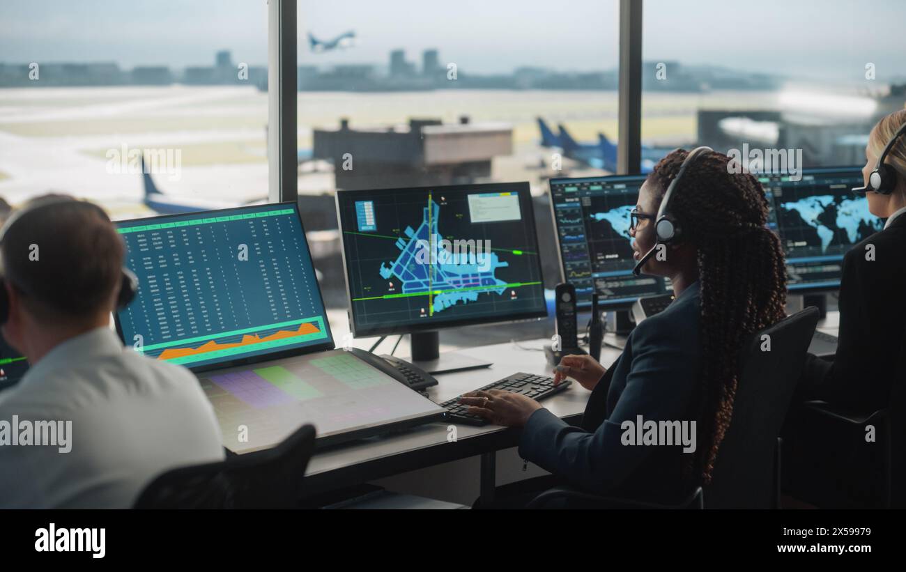 Female Air Traffic Controller with Headset Talk on a Call in Airport ...