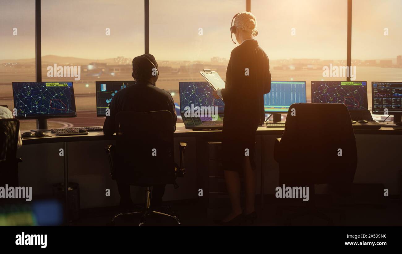 Female Air Traffic Controller with Headset Talk on a Call in Airport ...