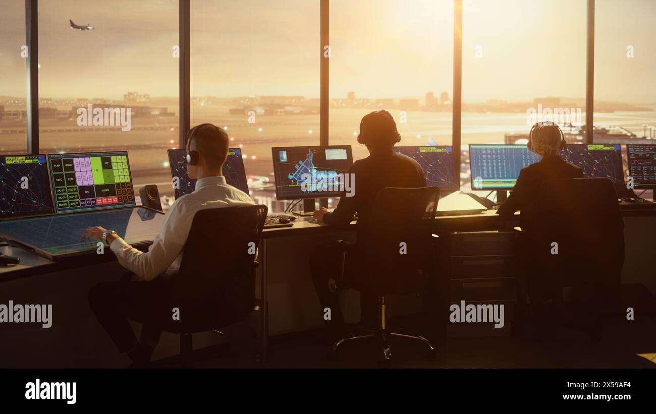 Diverse Air Traffic Control Team Working in a Modern Airport Tower at ...