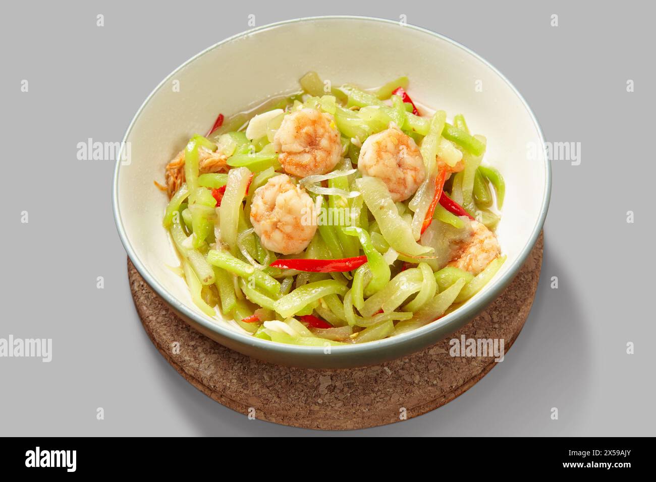 A bowl of stir-fried fresh chayote with some shrimp Stock Photo - Alamy