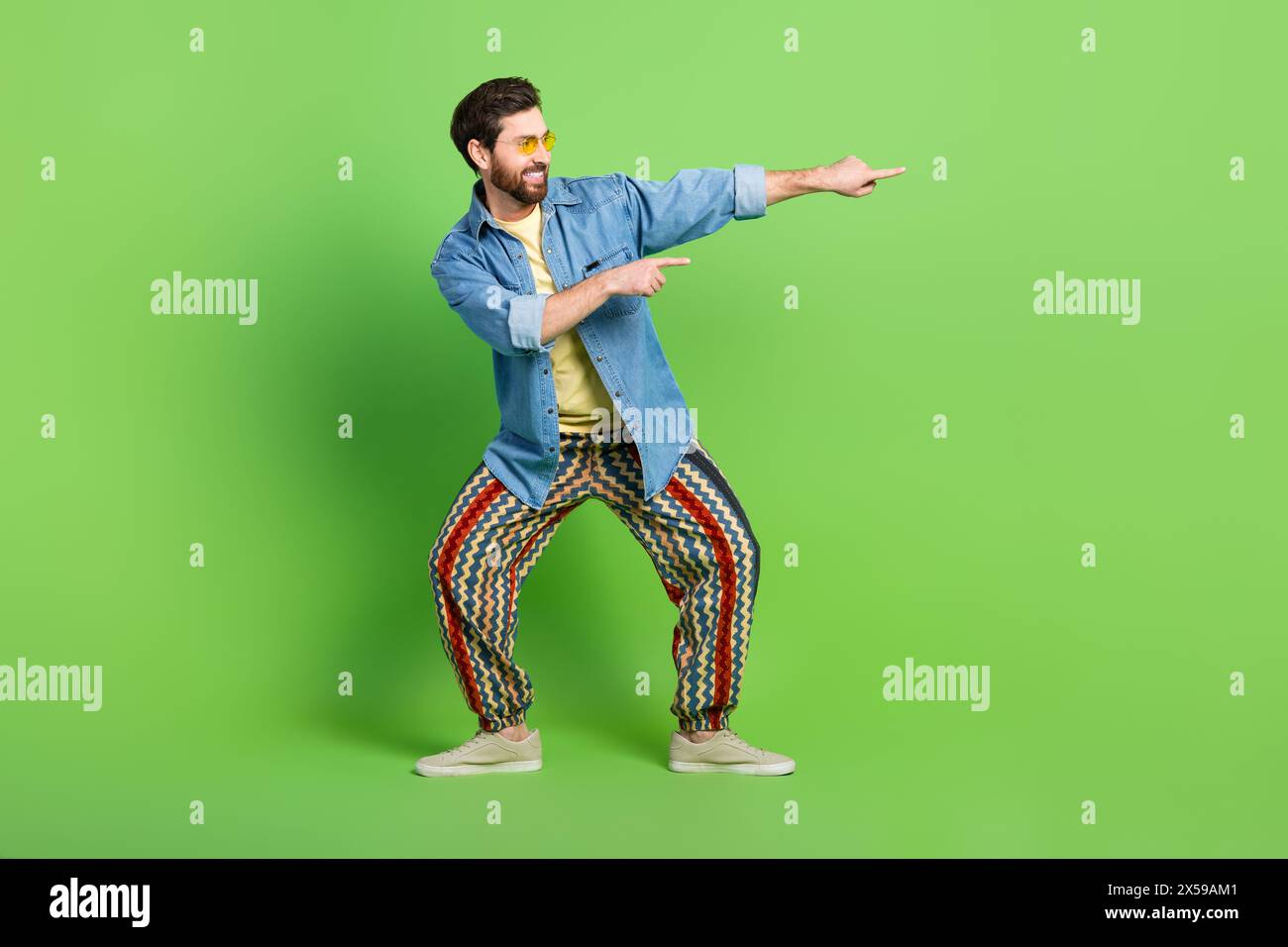 Full length photo of cheerful handsome guy wear denim jacket dancing ...