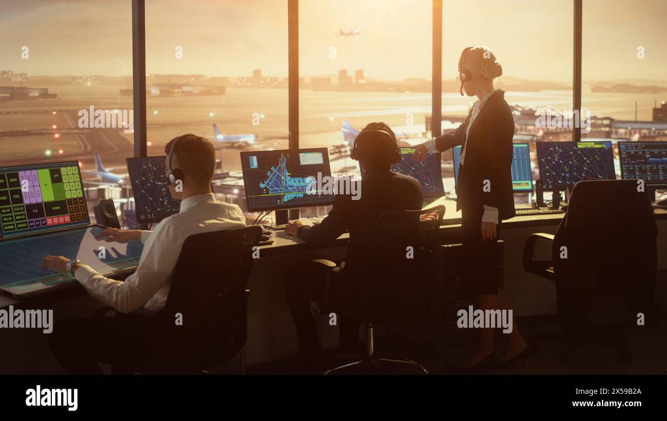 Diverse Air Traffic Control Team Working in a Modern Airport Tower at ...