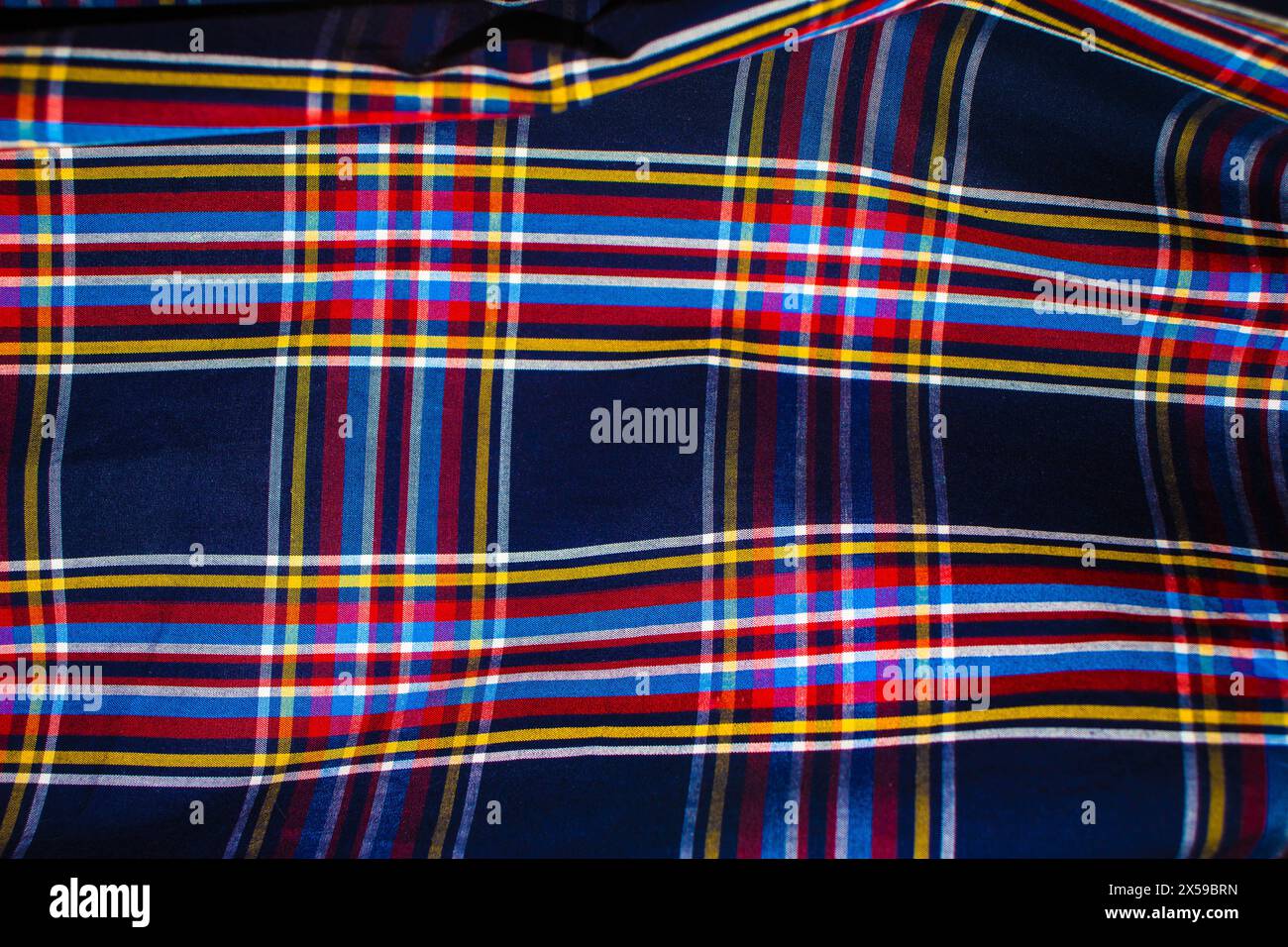 Shirt fabric in colored checkered pattern.Natural textile background ...