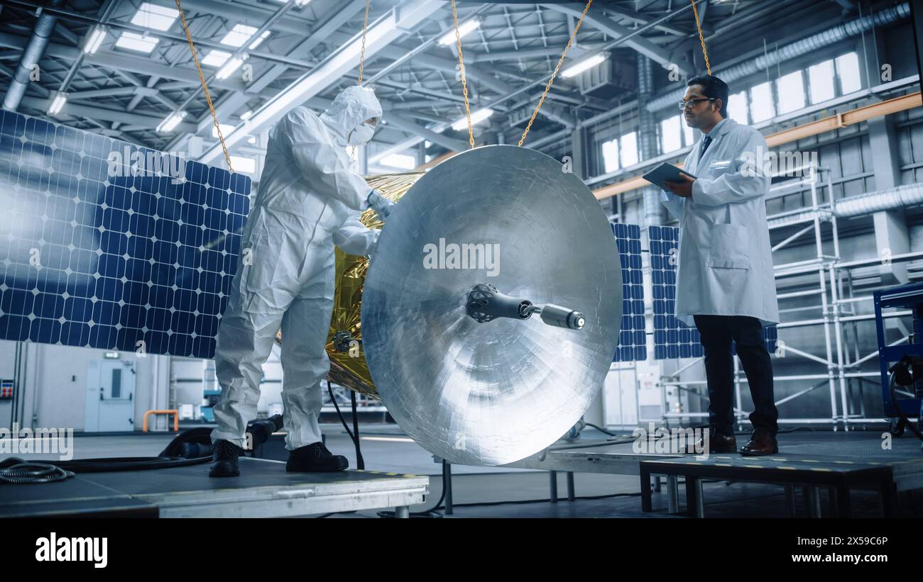 Engineer and Technician Working on Satellite Construction. Aerospace ...