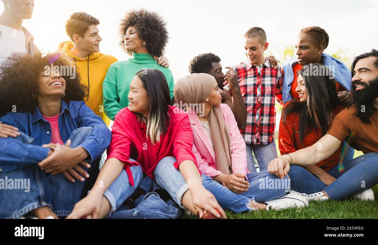 Young diverse people having fun outdoor chatting together - Diversity ...