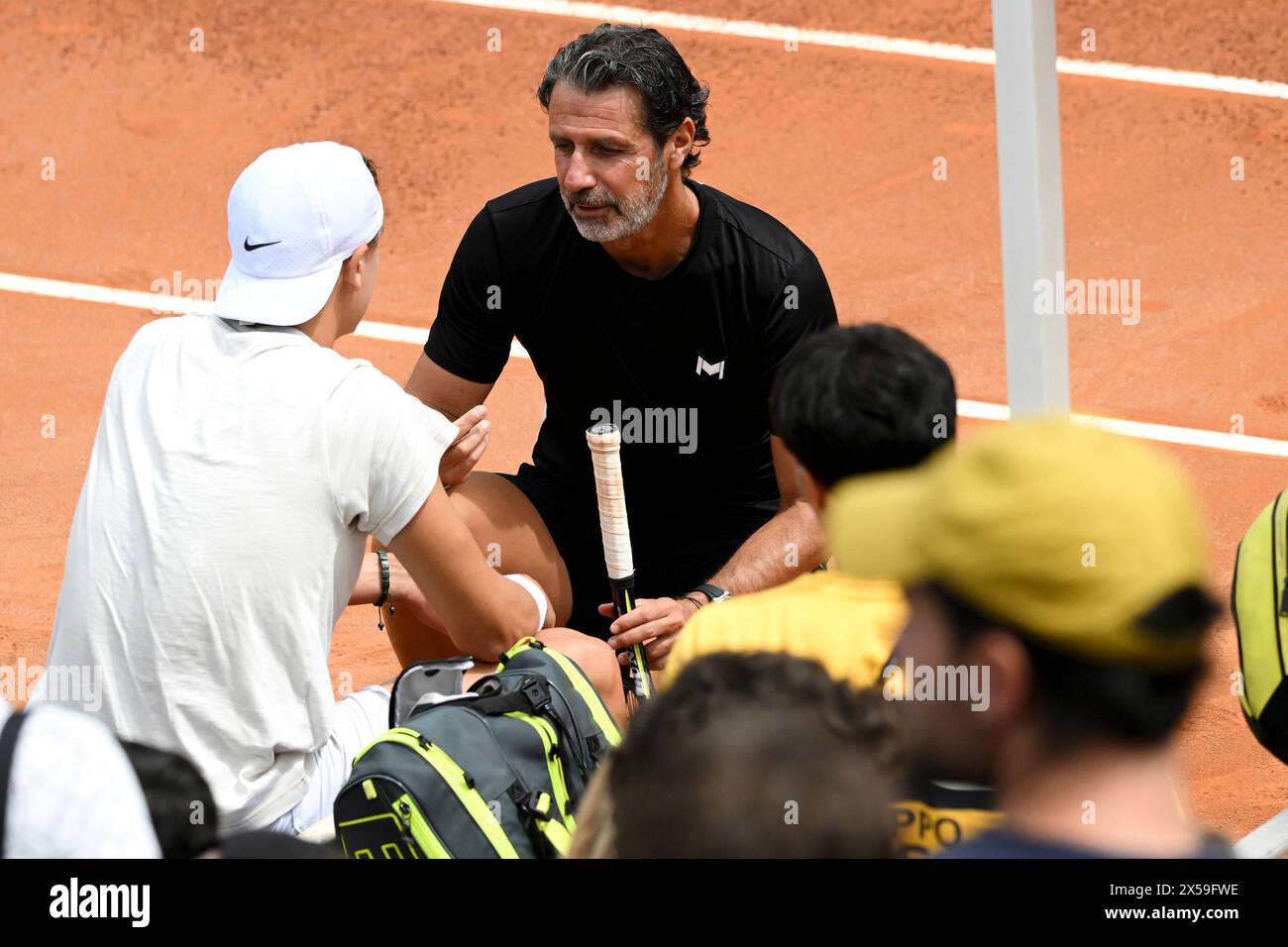 Rome, Italy. 08th May, 2024. Holger Rune of Denmark talks with his coach Patrick Mouratoglou of ...