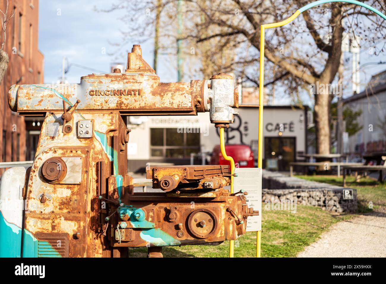 Antique sewing machine in a park in montreal industrial zone near canal ...