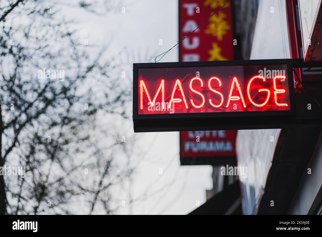 Neon massage sign in montreal chinatown Stock Photo - Alamy