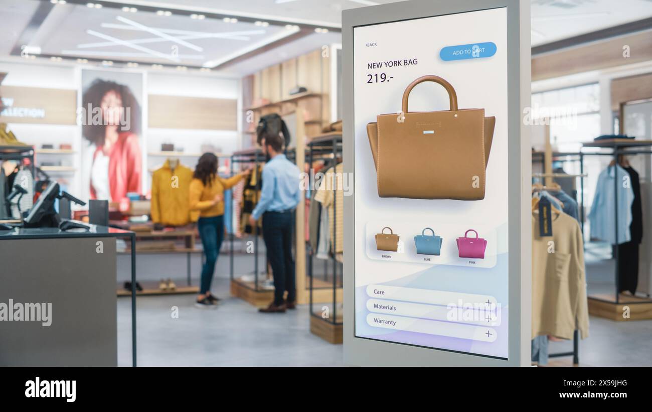Woman choosing clothes in outlet hi-res stock photography and images ...