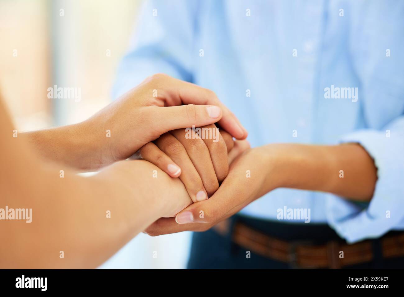 Holding hands, support and trust with people in office for helping ...