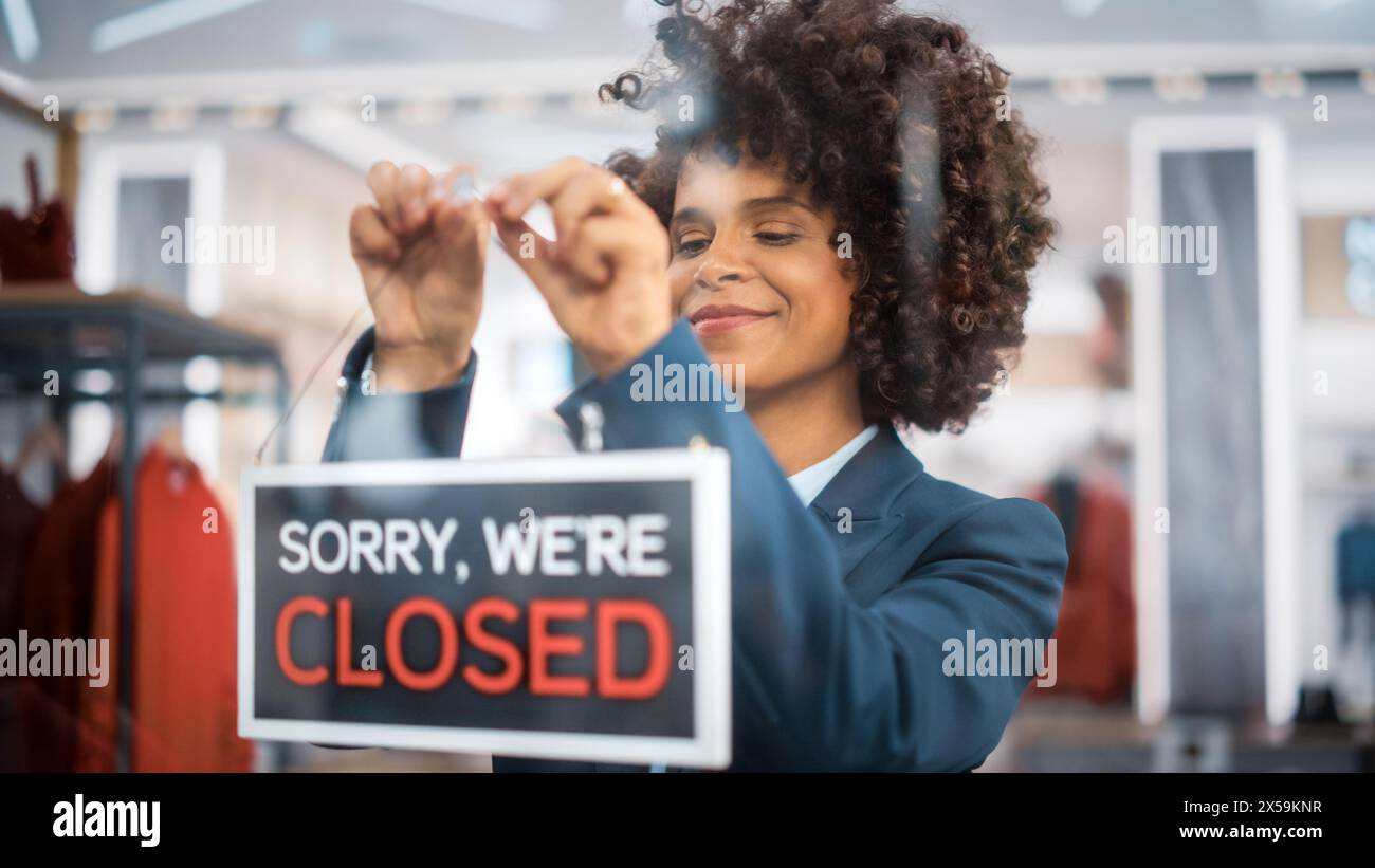 Stylish African American Clothing Shop Manager Changes Fashion Store ...