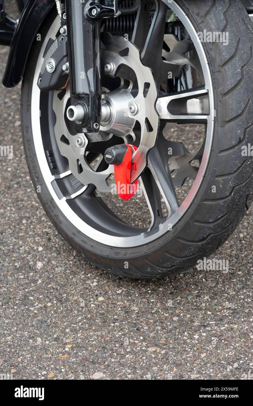 Protection Against, Motorcycle Disc Lock on Front Wheel Stock Photo - Alamy