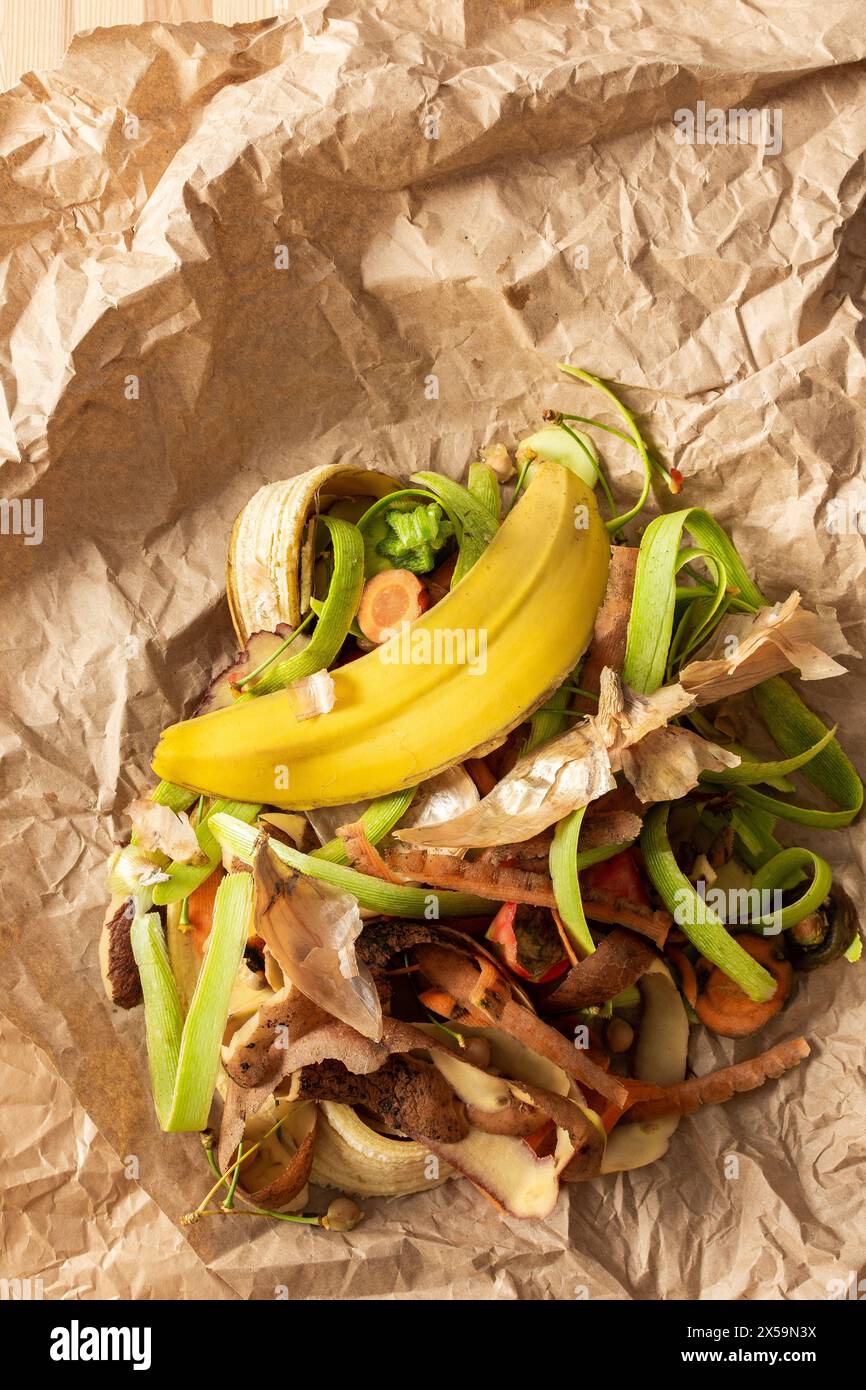 Food organic waste on eco friendly parchment paper, fruit and vegetable ...