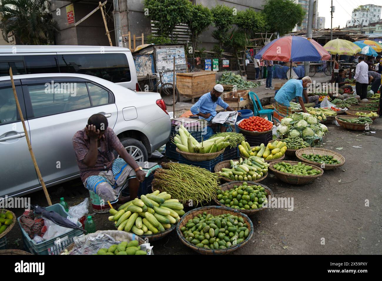 Vegetable vendors with their products. Karwan Bazaar area. Dhaka ...