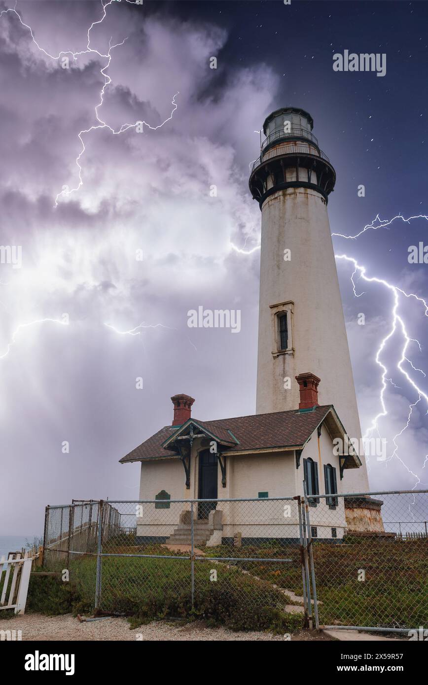 Dramatic coastal lighthouse under lightning storm, California Stock ...