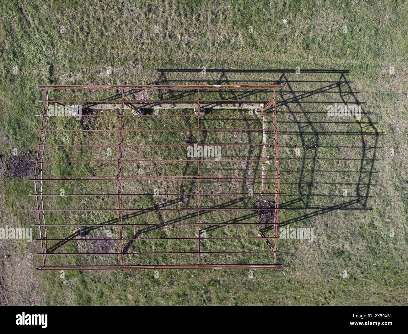 View from above of the metal skeleton of an agricultural shed, whose ...