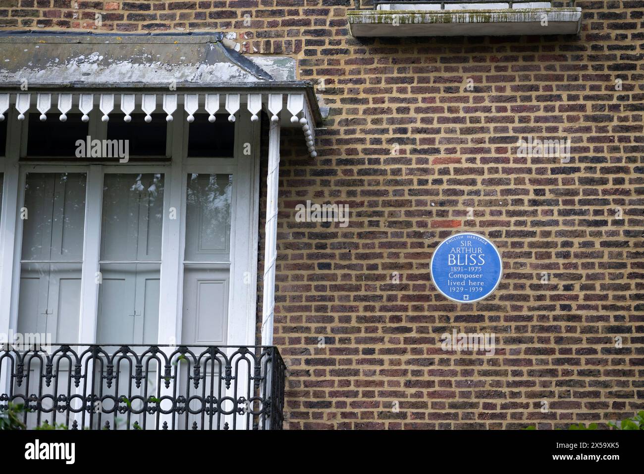 Sir Arthur Bliss blue plaque at East Heath Road, Hampstead village in ...