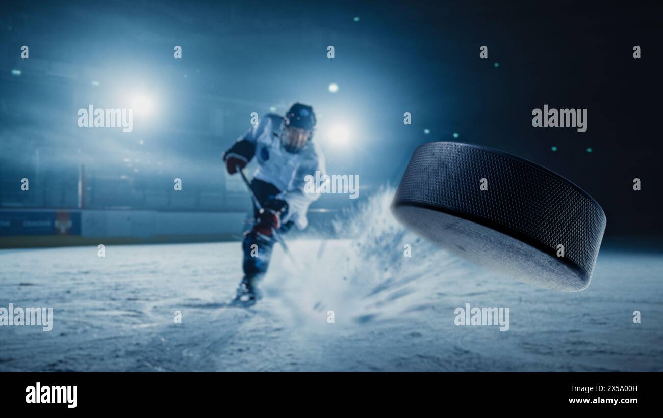 Ice Hockey Rink Arena: Professional Player Shooting the Puck with ...