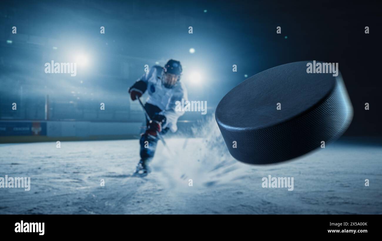 Ice Hockey Rink Arena: Professional Player Shooting the Puck with ...