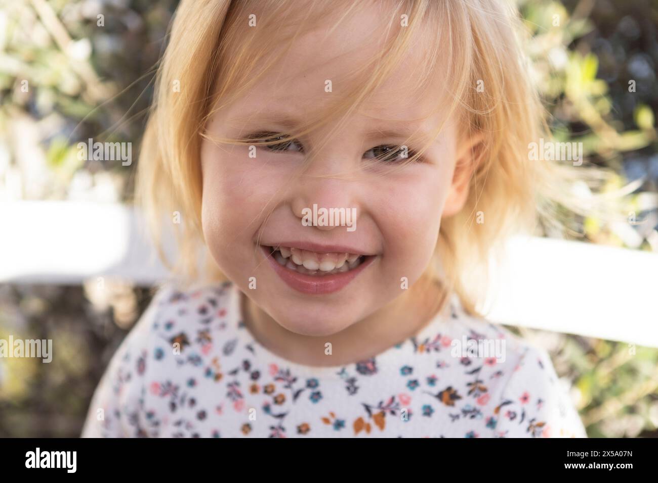 Smiling girl portrait, 3 years old caucasian blond hair daughter posing for portrait Stock Photo ...