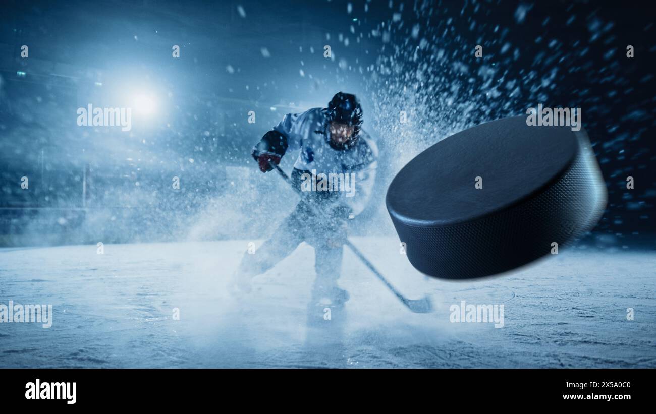 Ice Hockey Rink Arena: Professional Player Shooting the Puck with ...
