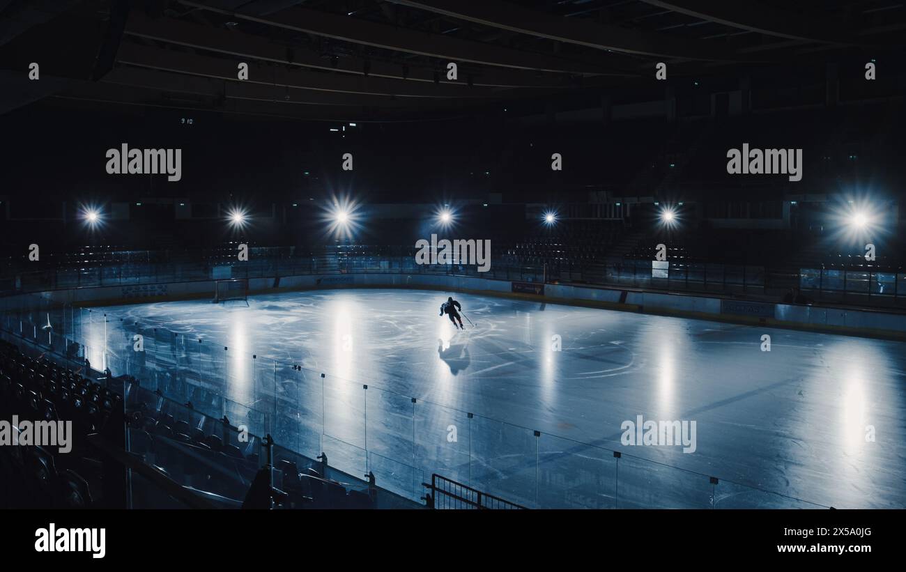 Ice Hockey Rink Arena: Professional Player Training Alone. Skates ...