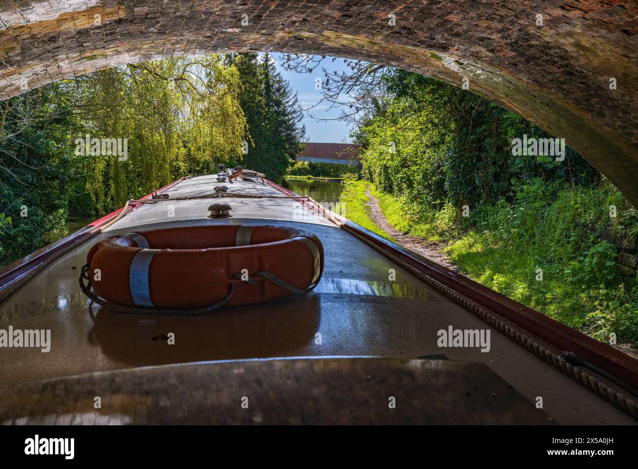 Rugby, Warwickshire, England - The Oxford Canal – A narrowboat under an ...