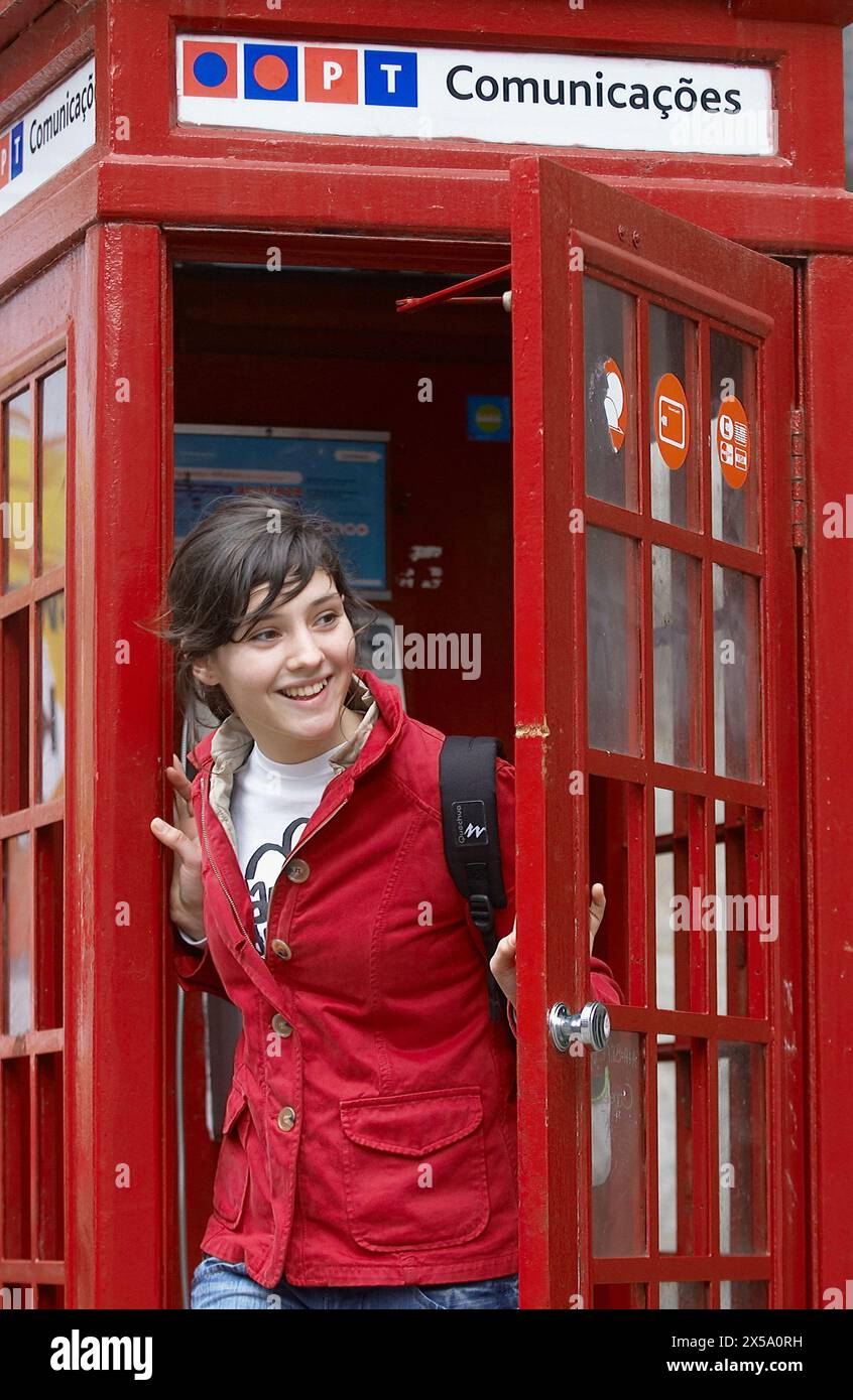 16 year old girl in phone booth, Porto. Portugal Stock Photo - Alamy