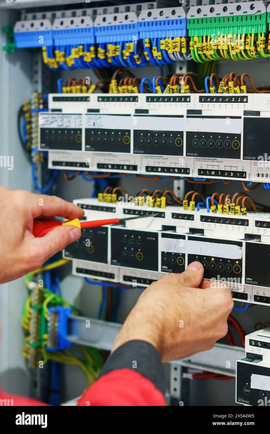 The electrical technician replaced an auxiliary relay in the electrical ...