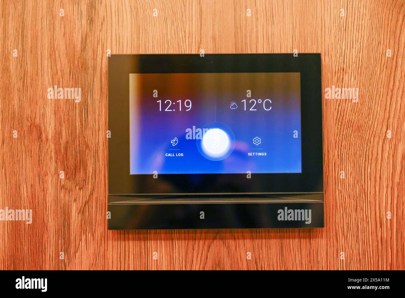 Realistic thermostat at home. Temperature controller Stock Photo - Alamy
