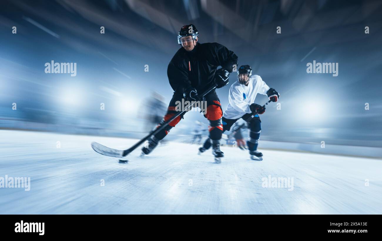 Ice Hockey Rink Arena: Professional Forward Player Masterfully Dribbles ...