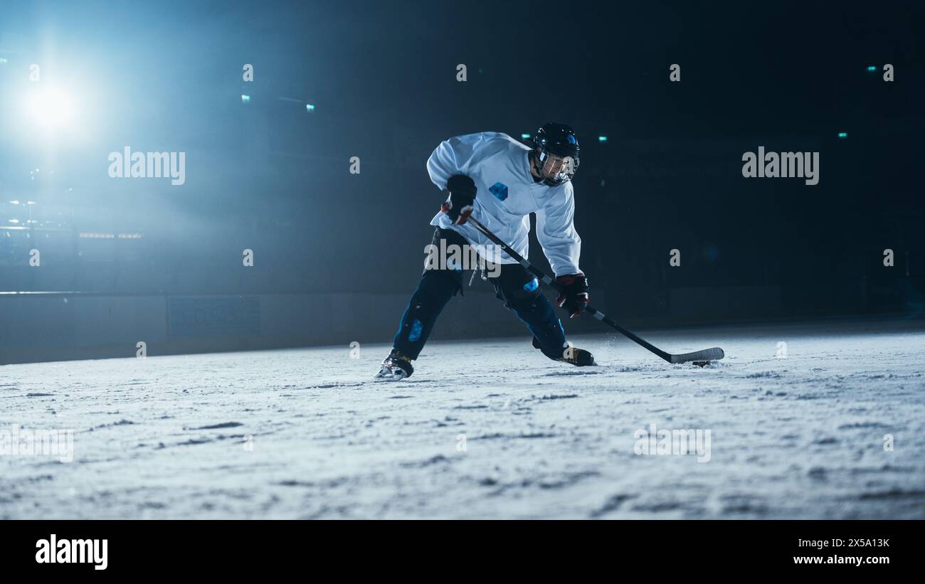 Ice Hockey Rink Arena: Professional Player Training Alone. Skates ...