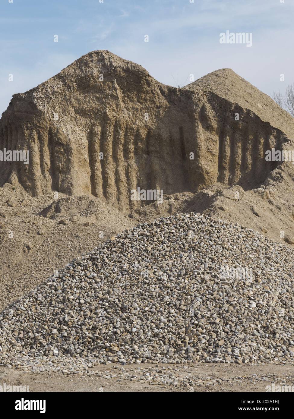Gravel and crushed stone heap in a building materials quarry and ...