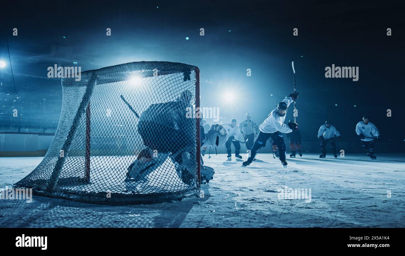 Ice Hockey Game in Rink Arena: Forward Player who Does Slapshot, Shoots ...