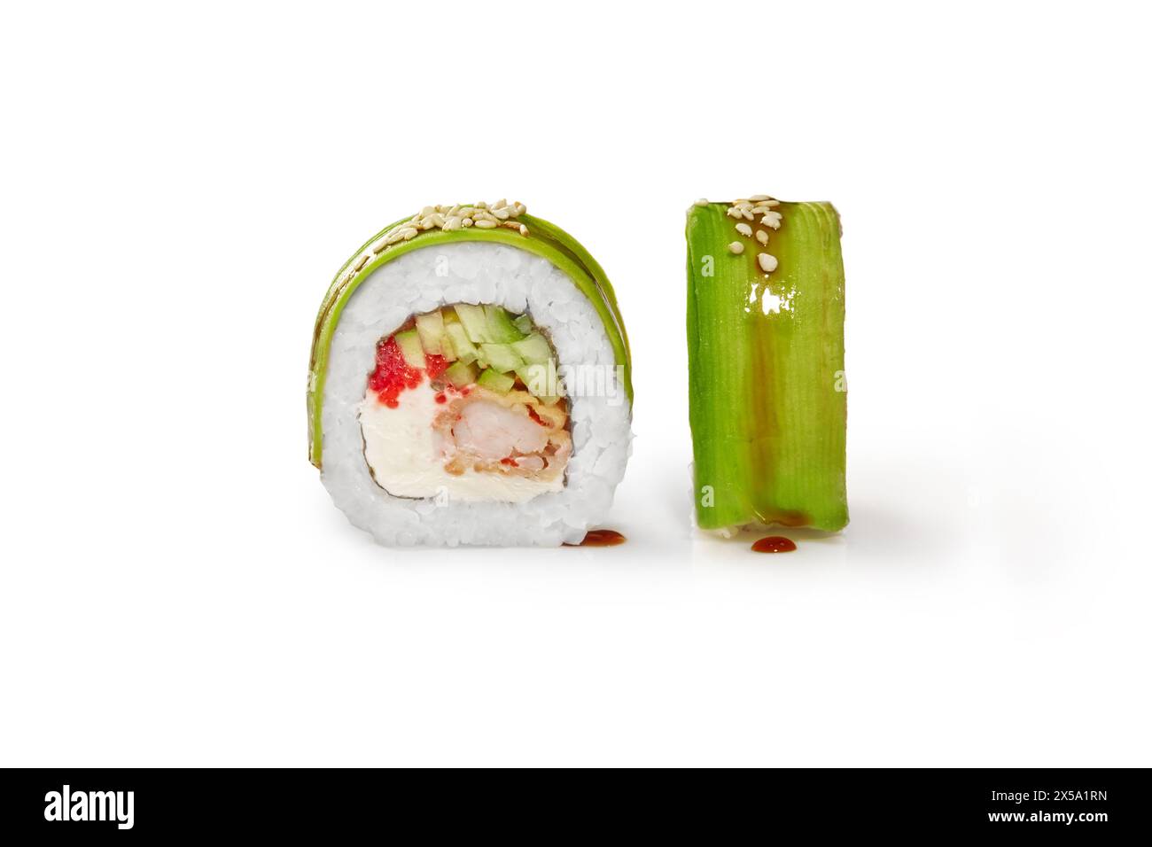 Avocado sushi roll with tempura shrimp and tobiko on white Stock Photo ...