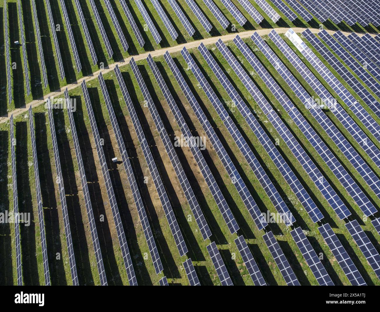 Ground-mounted photovoltaic systems seen from above. This system is ...