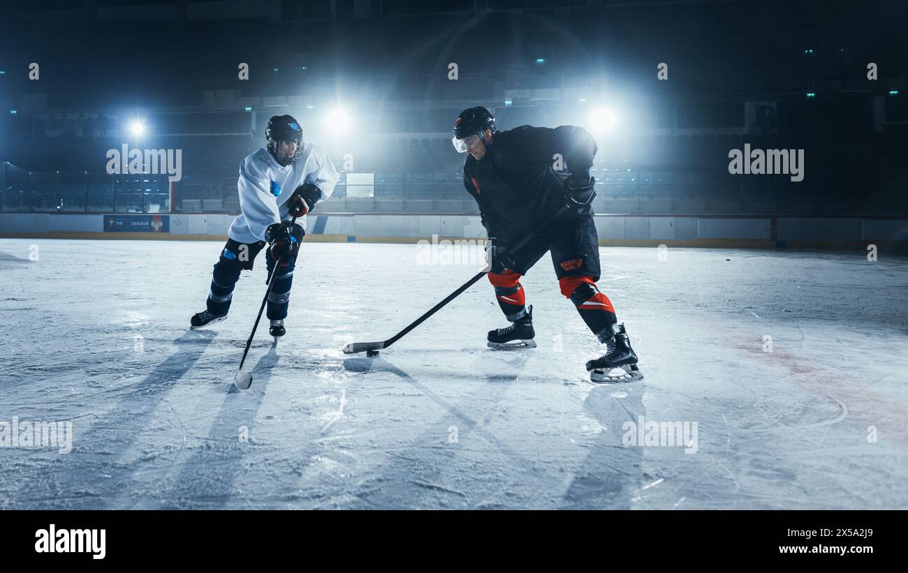 Ice Hockey Rink Arena: Two Young Players Training, Learning Stick and ...